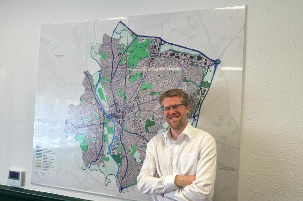 Tom Collins explains response delays to residents following election