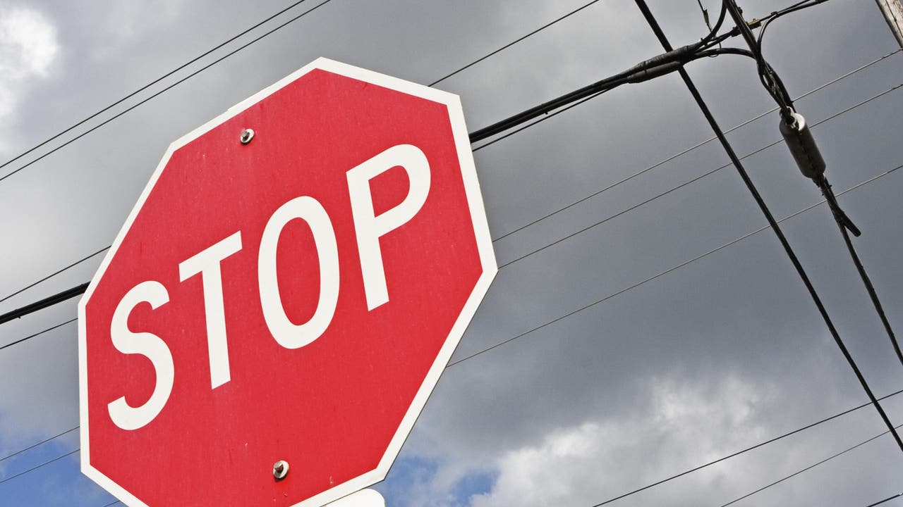 One dead, five others injured in three-vehicle crash at a stop sign ...