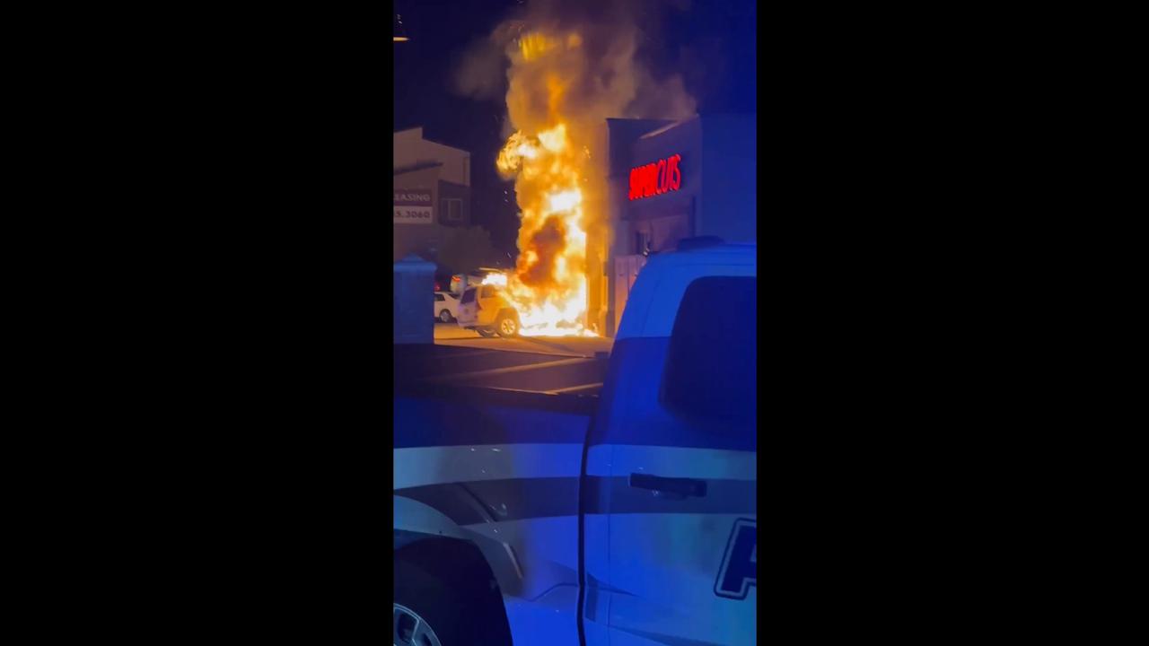 Car crashes into Domino's Pizza branch before exploding in fireball