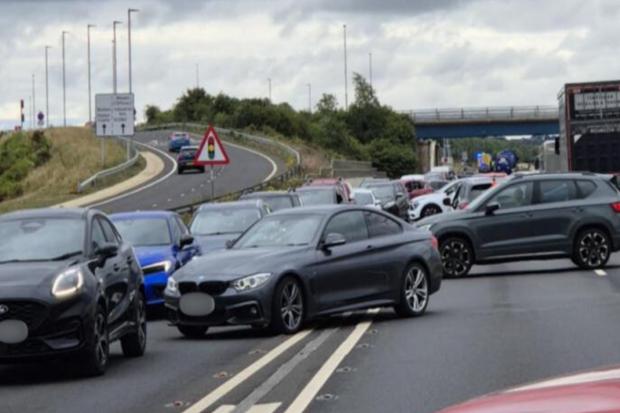 Man in 50s remains in hospital after car flips over during A19 crash
