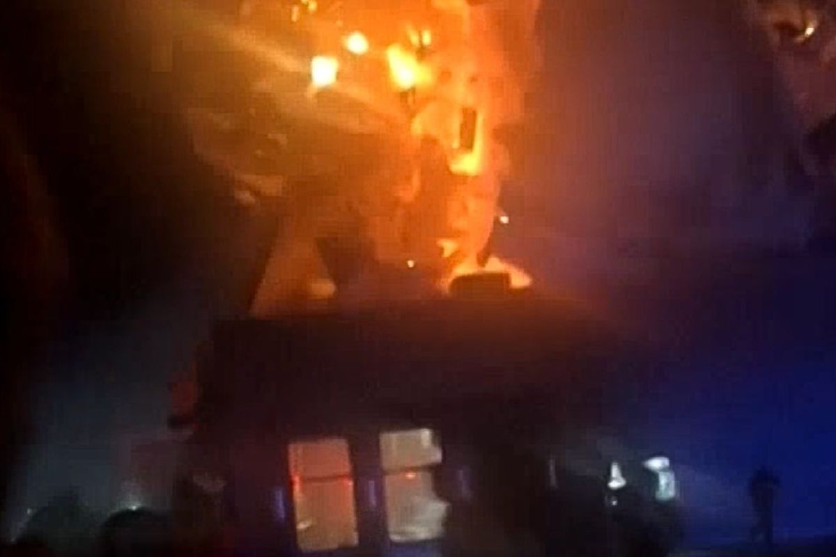 Explosion tears roof off Domino’s Pizza after car crashes into restaurant