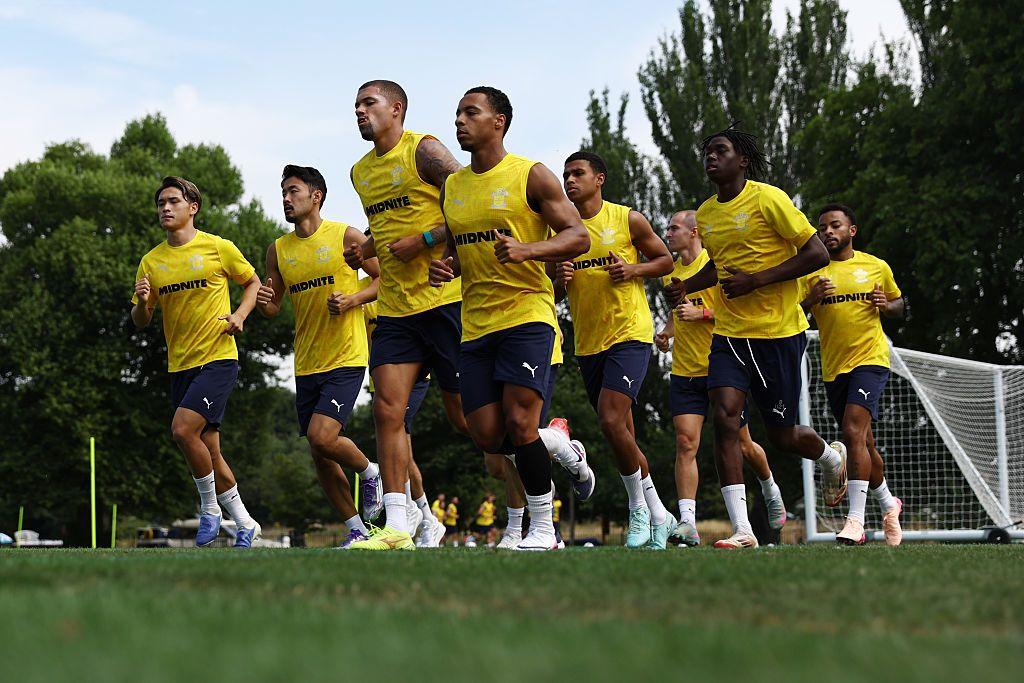 What do football clubs do in pre-season training?