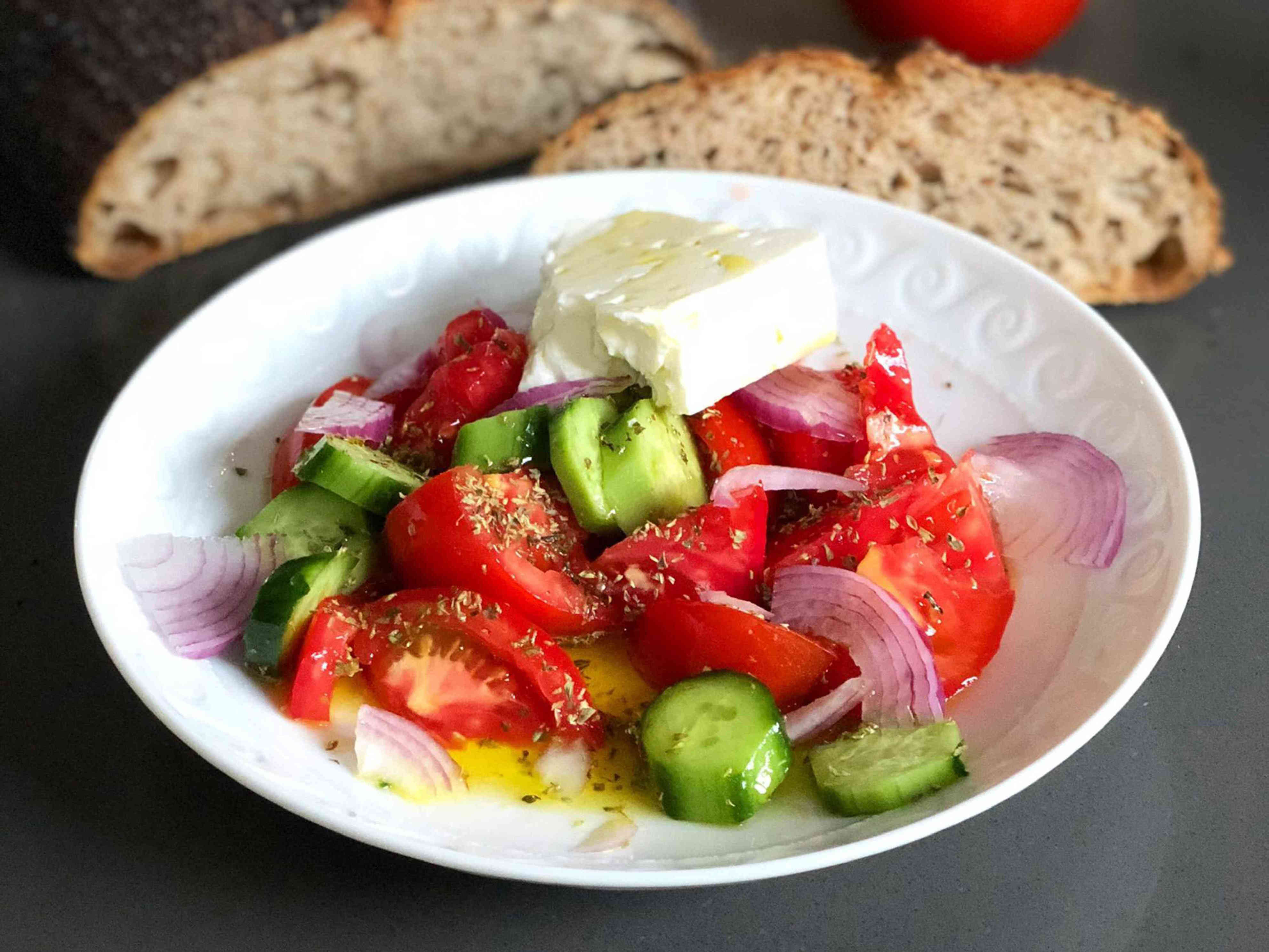 Greek people don't use vinegar in their Greek salads—they do this instead