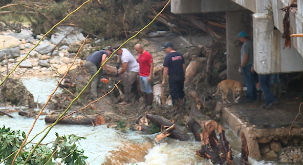 ‘It’s sobering’: Volunteers search debris for bodies after Texas flooding