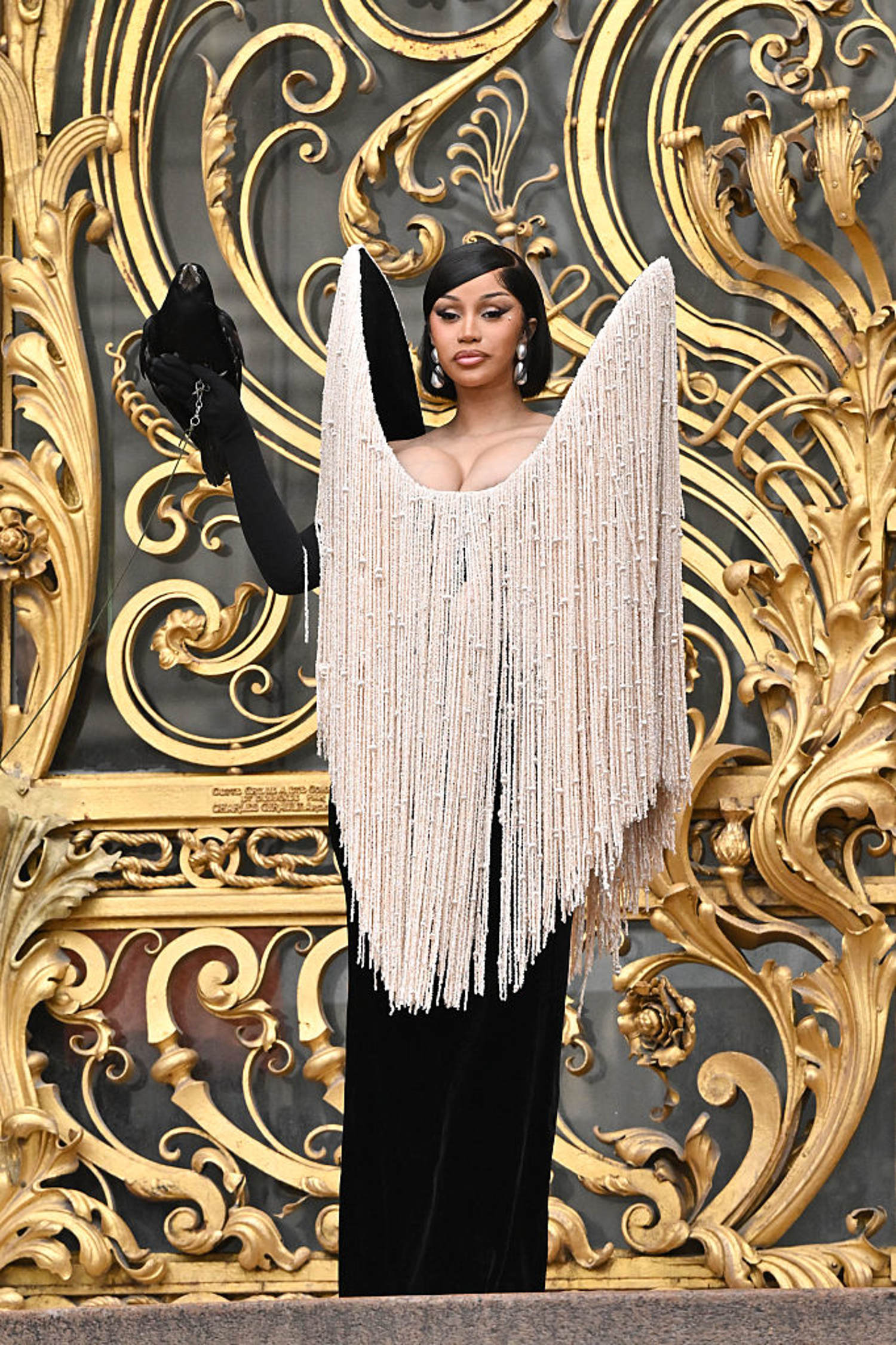 Cardi B Accessorizes Her Red Carpet Look with ... a Live Crow