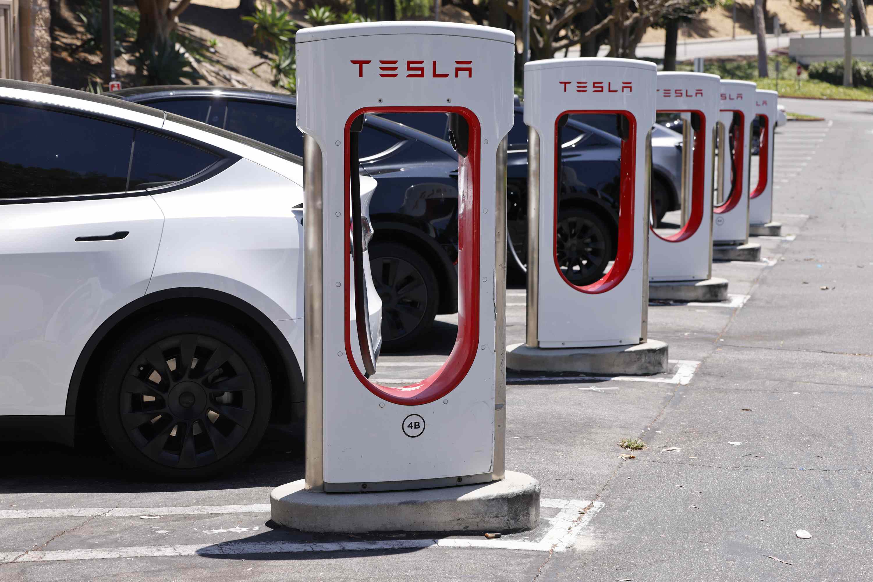 Top Stock Movers Now: Tesla, Shell, Uber, and More