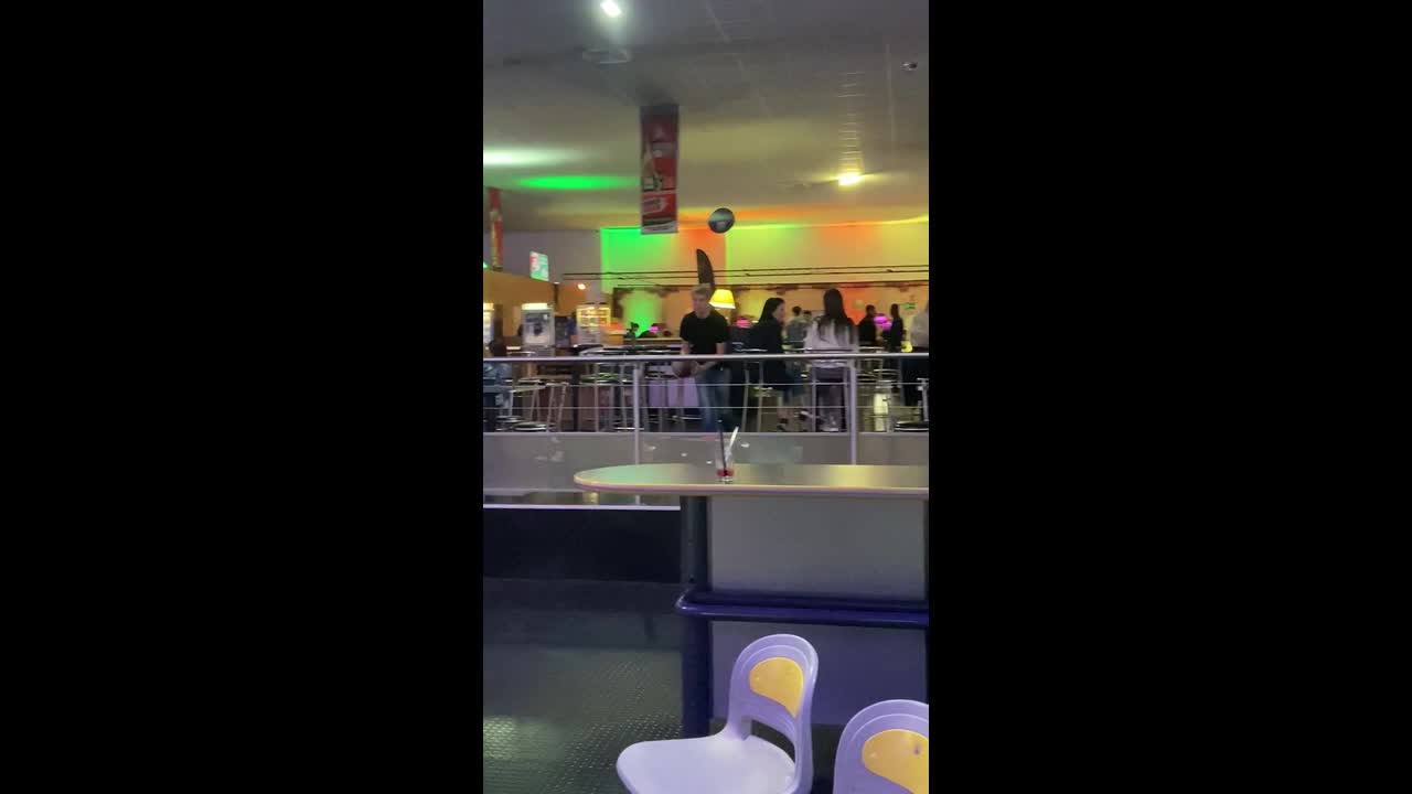 Friend attempts creative bowling shot in Mulhouse, France