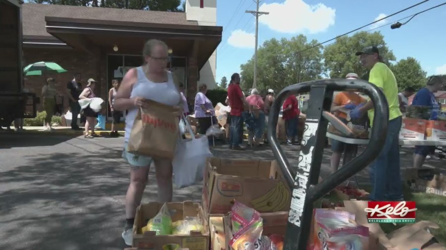 Flash food giveaway ‘helps on the grocery bill’