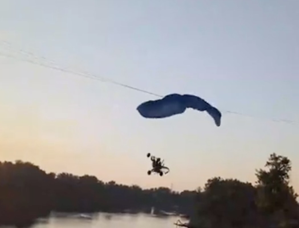 Watch: Terrifying moment a powered parachute pilot crashes into power line
