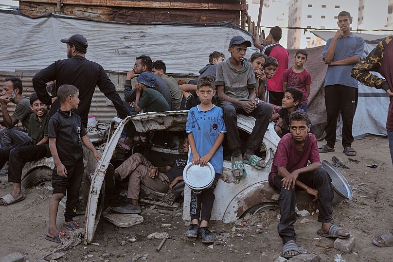 At least 20 killed in stampede at Gaza distribution site, US aid group says