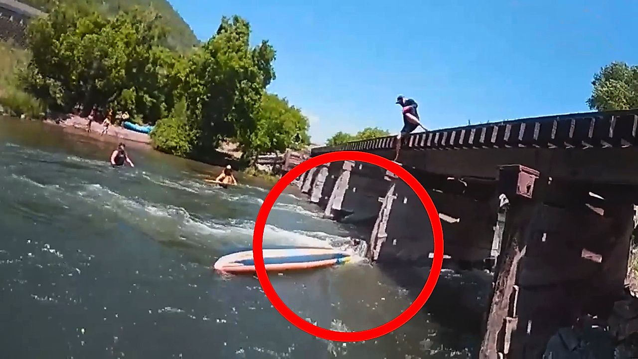 Hero ranger rescues paddleboarder trapped under Utah bridge