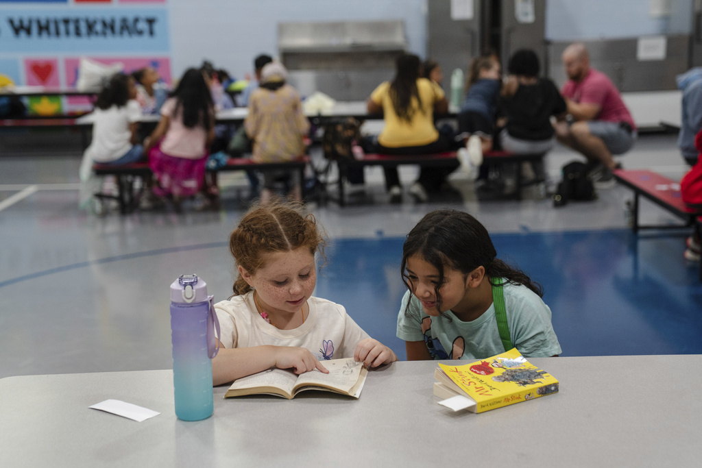More than 20 states sue Trump administration over frozen after-school ...