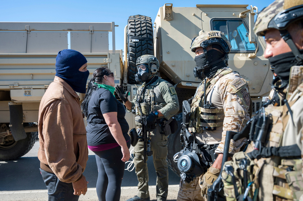 A chaotic raid, 360 arrests, and a tragic death: What happened at ...