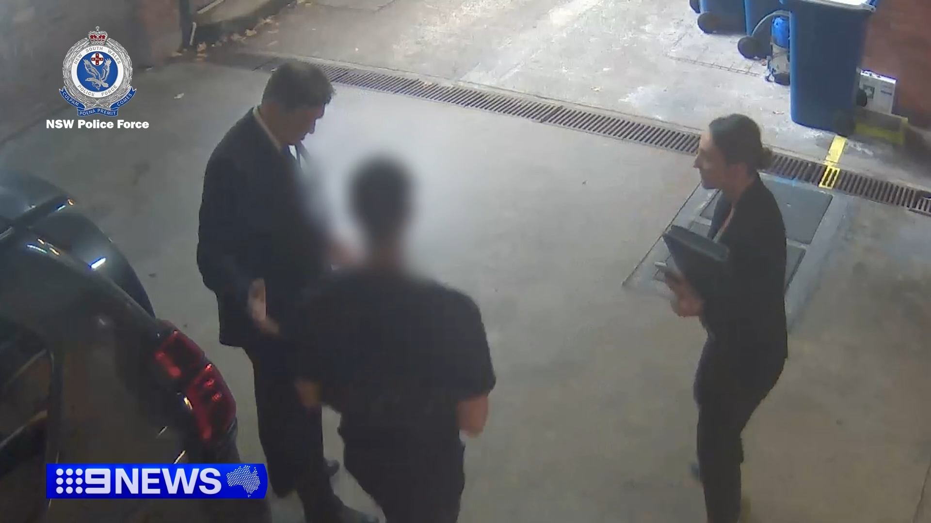 Mum shows up in court for cop son as double-murder case delayed