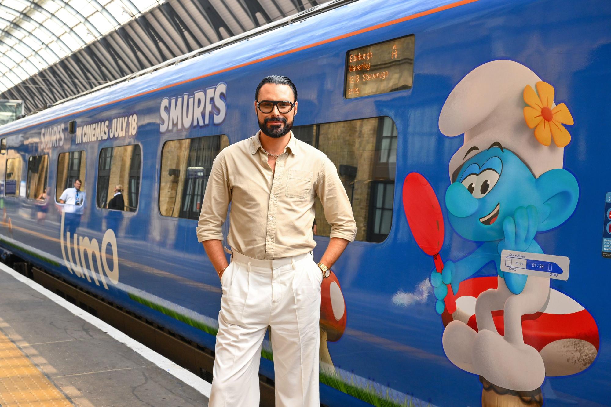 Rylan unveils special Lumo Smurfs Train to celebrate launch of new movie