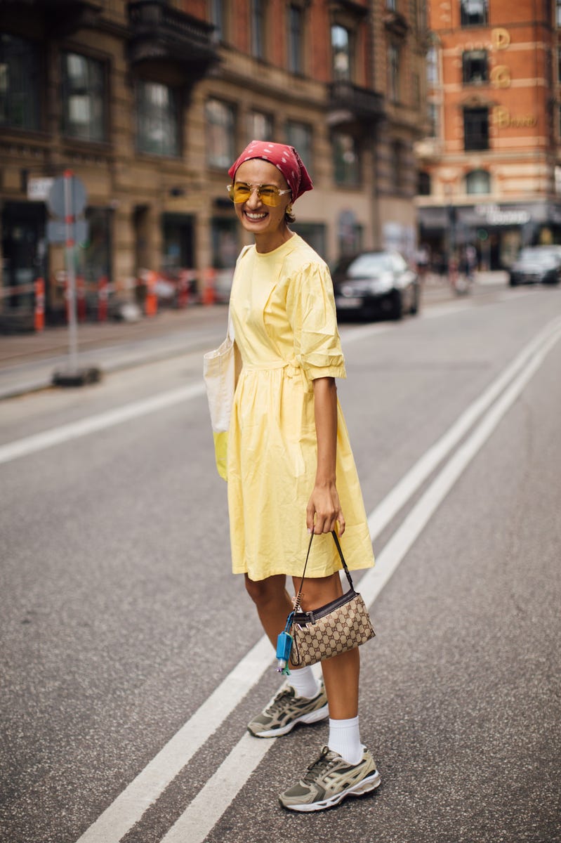 7 sleek outfit ideas for styling a dress and trainers this summer