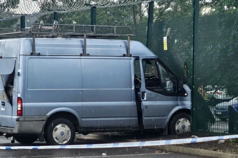 Edinburgh van with 'hole sawn in back and wedged in fence' as police swoop