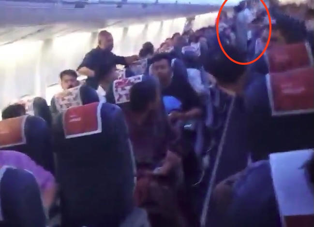 Passengers delayed for 7 hours after two ‘unruly’ men attempt to storm ...