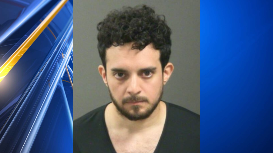 Former University of Arkansas professor pleads not guilty to possessing ...