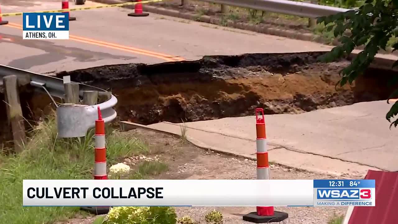 Flash flooding causes part of road to collapse
