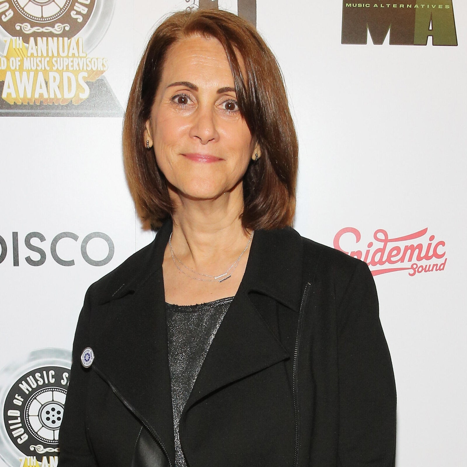 Arrest made in killings of "American Idol" exec and her husband, police say