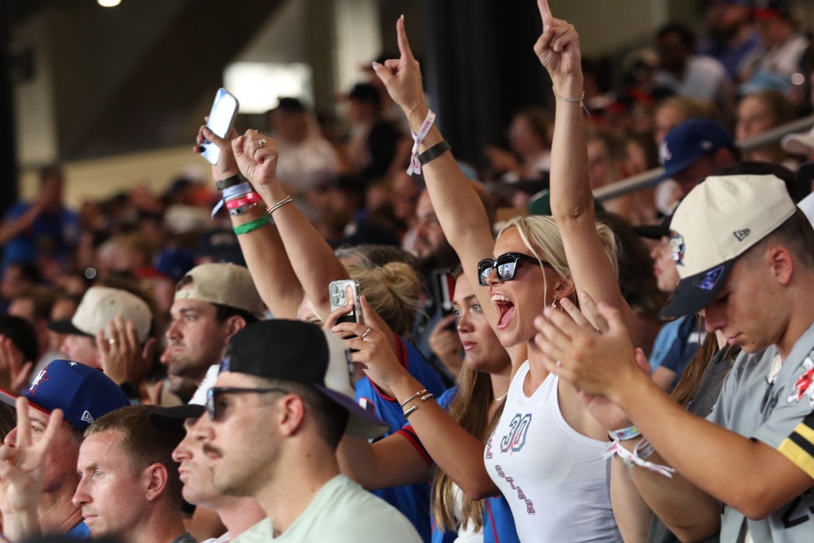 Fantastic photos capture LSU icon, SI Swim model Livvy Dunne at MLB games