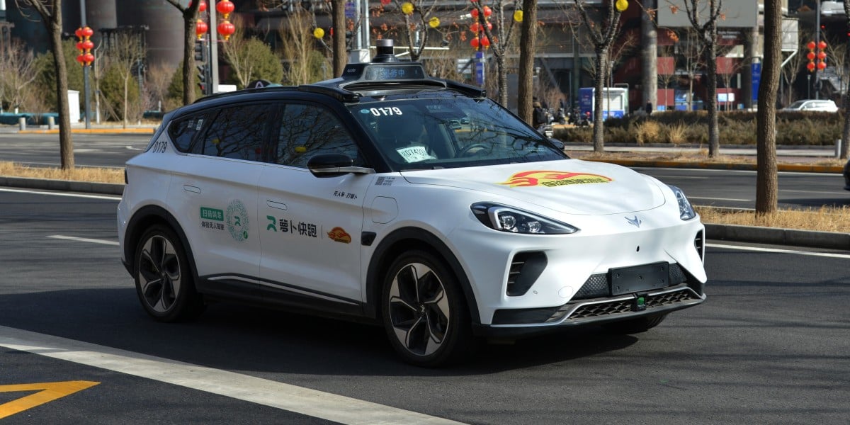 Uber to roll out thousands of robo-cabs built by China’s Baidu