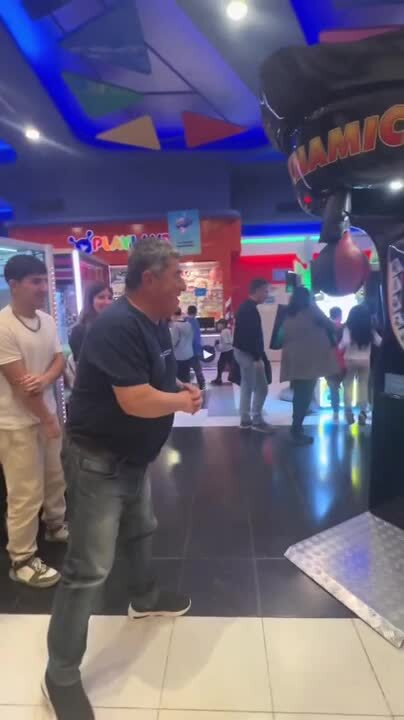 Man Misses and Falls at Punching Machine