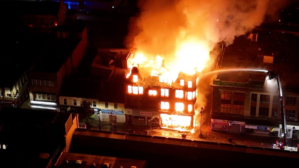 Footage shows shocking moment town centre building collapses in massive ...