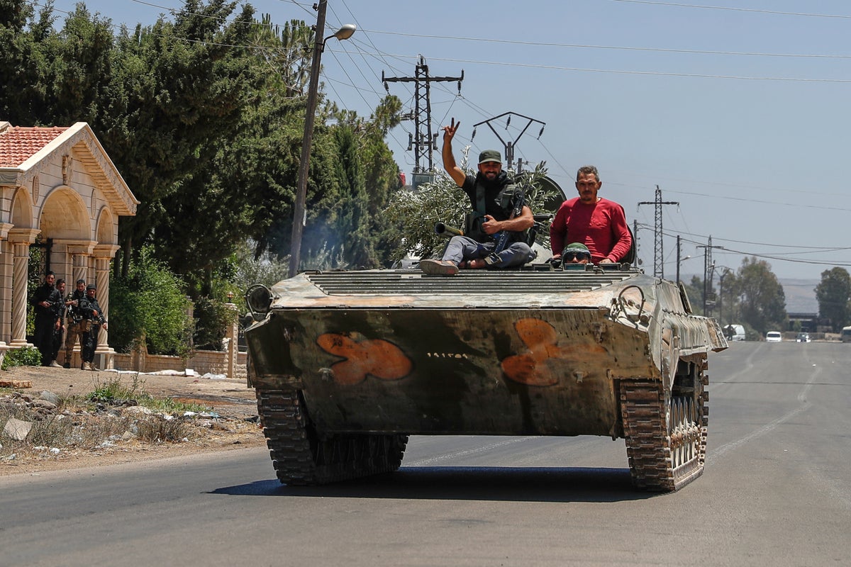 Israel targets Syrian capital after days of sectarian fighting