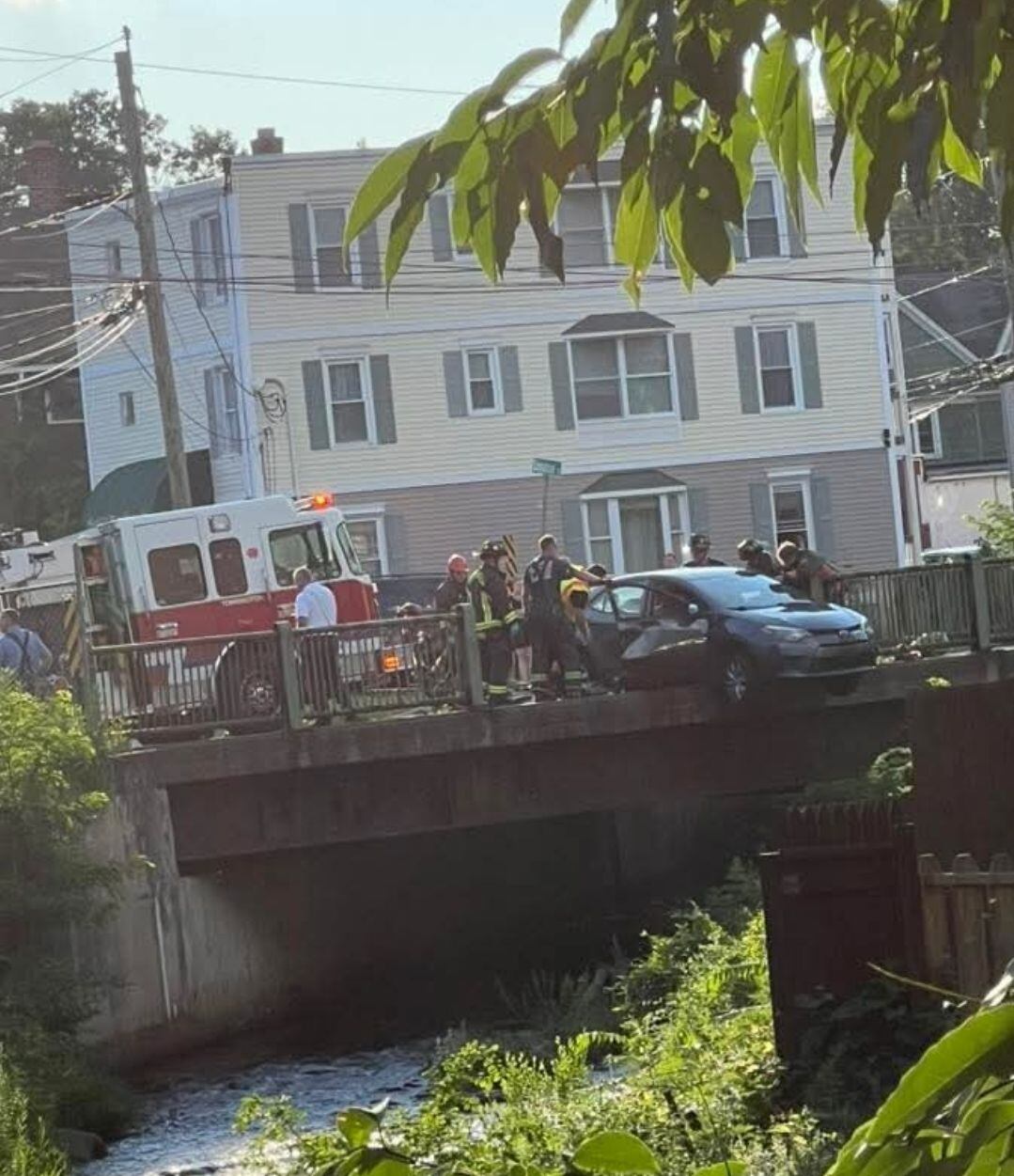 Car dangles from edge of bridge following Torrington crash