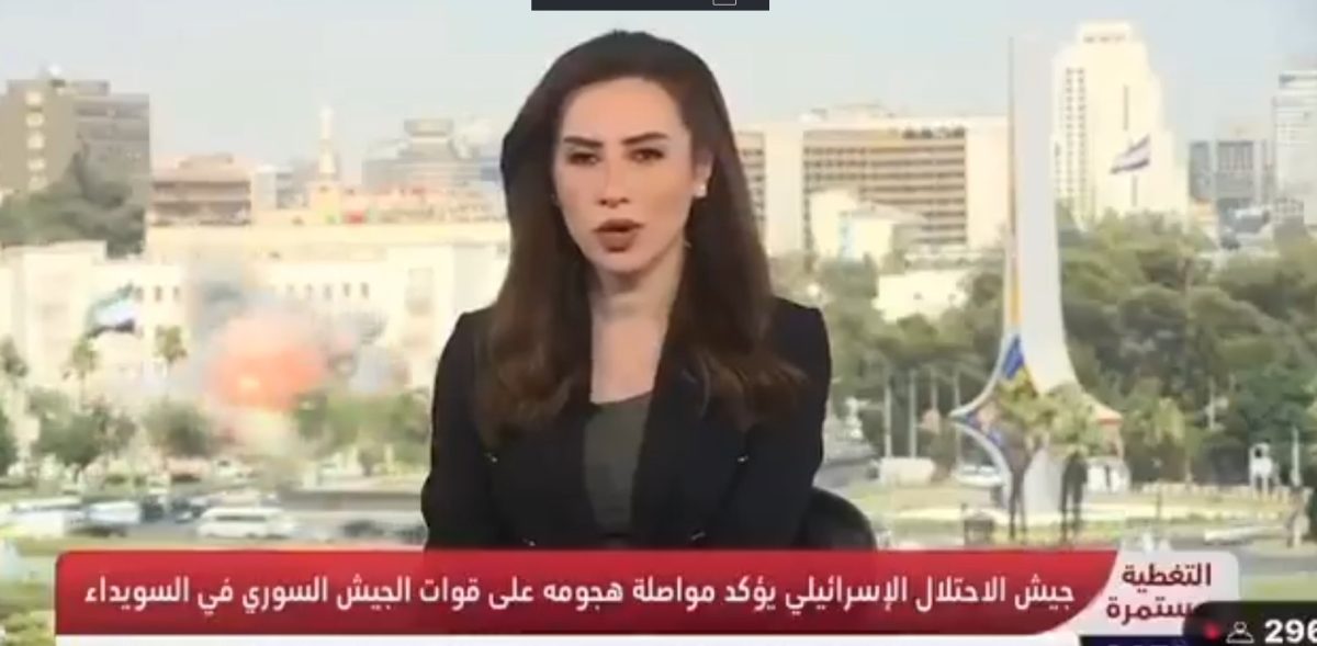 Terrified TV reporter runs for cover as Israel bombs Syrian military HQ