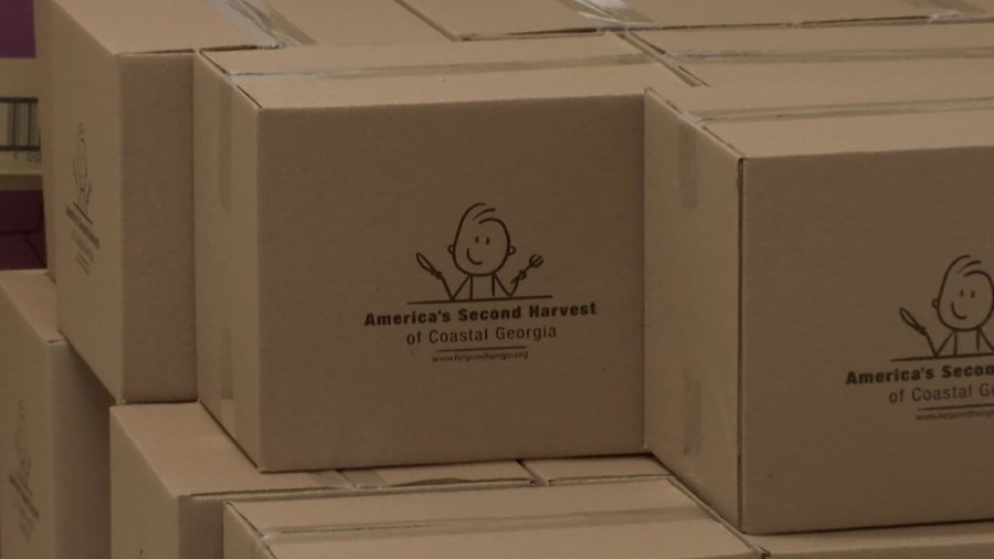 Gulfstream, CEMA, and Second Harvest pack 5,000 disaster relief food ...