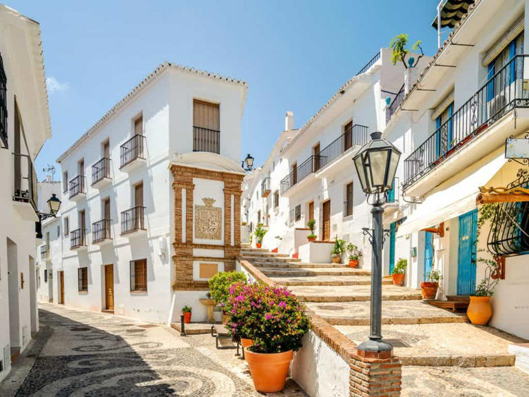 This Whitewashed Village Is Called the Prettiest in Spain—And It’s Easy ...
