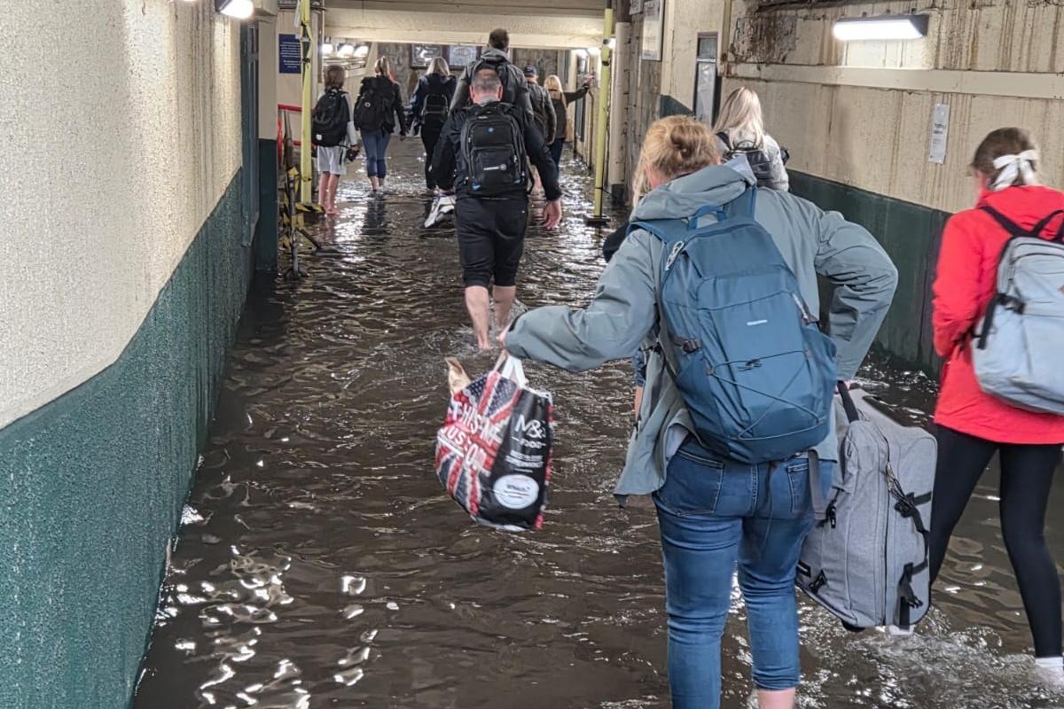 Train passengers forced to wade through knee-high water after Carnforth ...