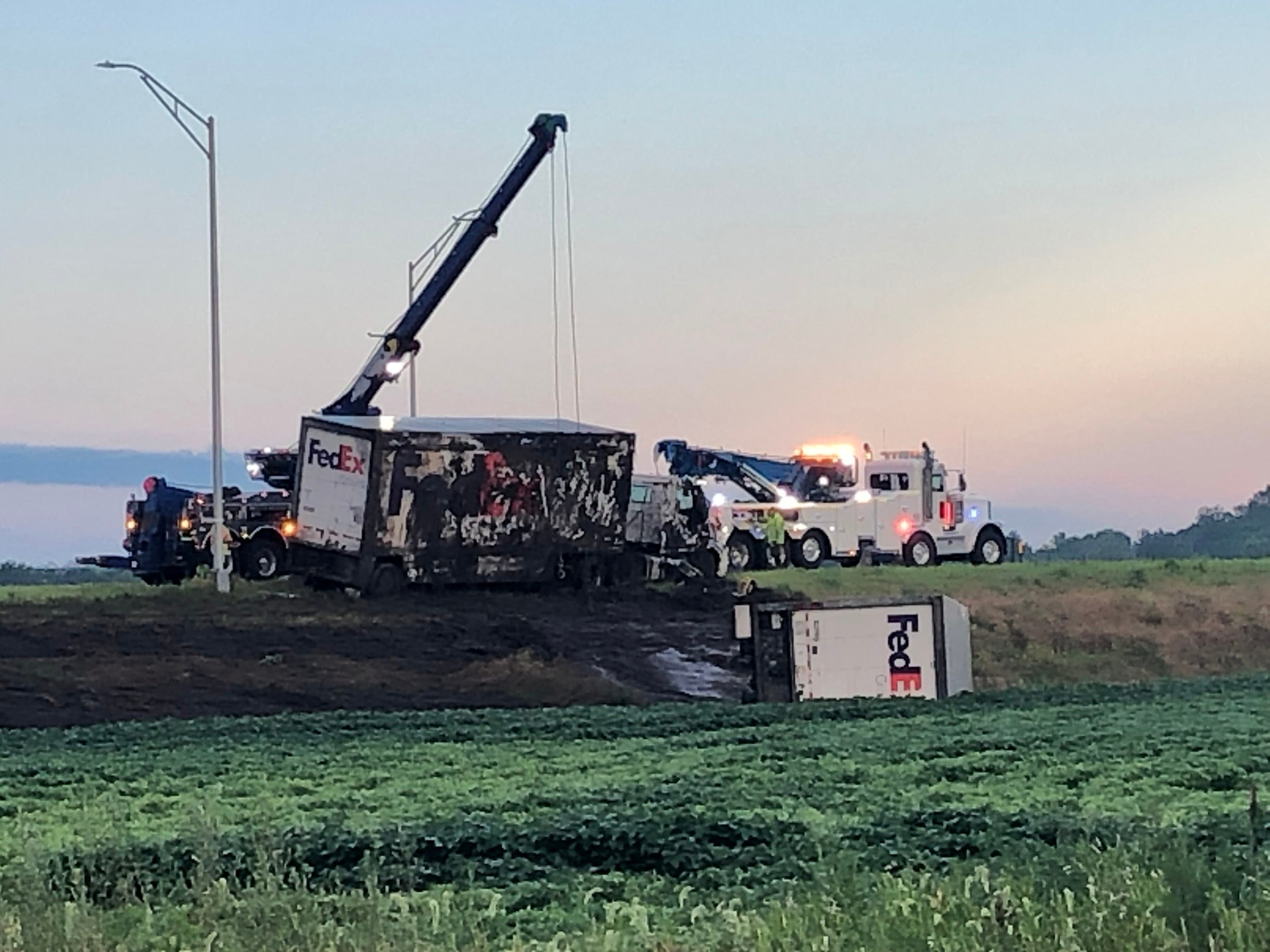FedEx truck rolls off highway in crash west of Omaha metro