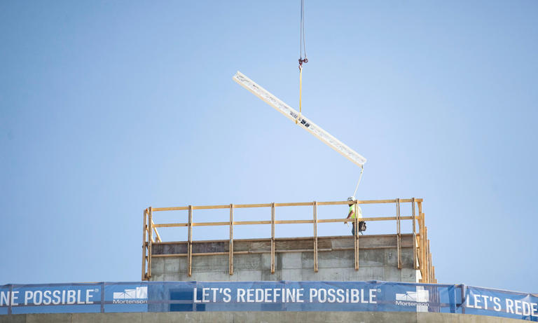 Beam tumbles during Nature and Culture Museum's topping off ceremony ...