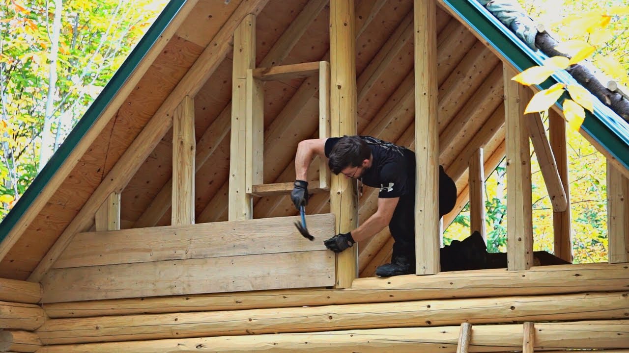Building A Log Cabin, Wood stove is ,Cladding the gable ends