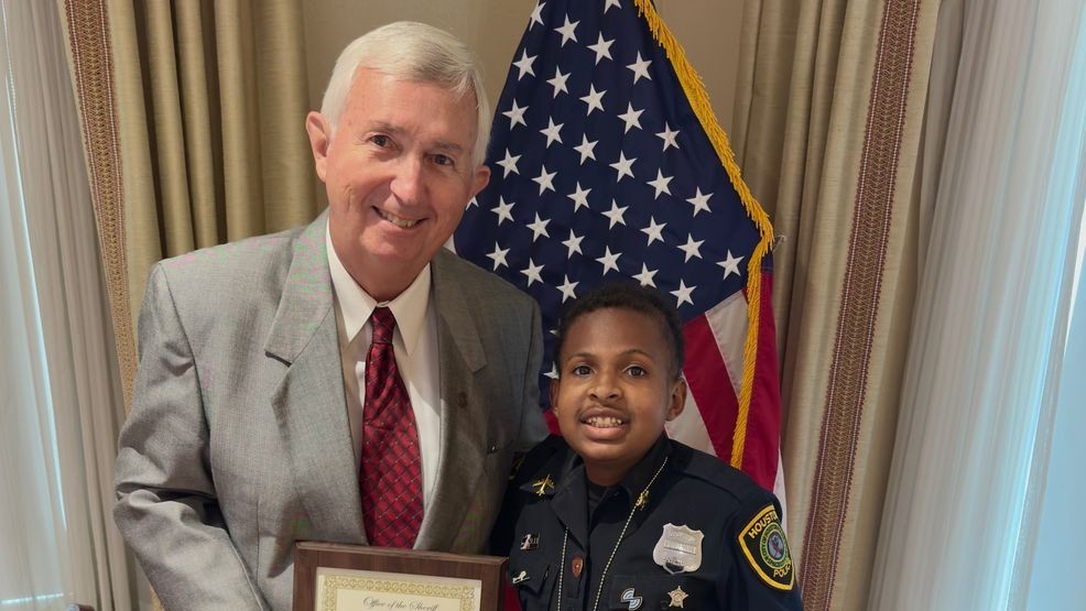 Young boy fighting cancer receives honorary sheriff's certificate by ...