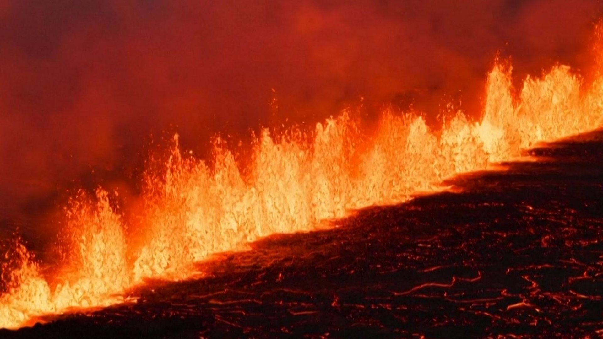 Volcano erupts in Iceland spewing lava from the ground