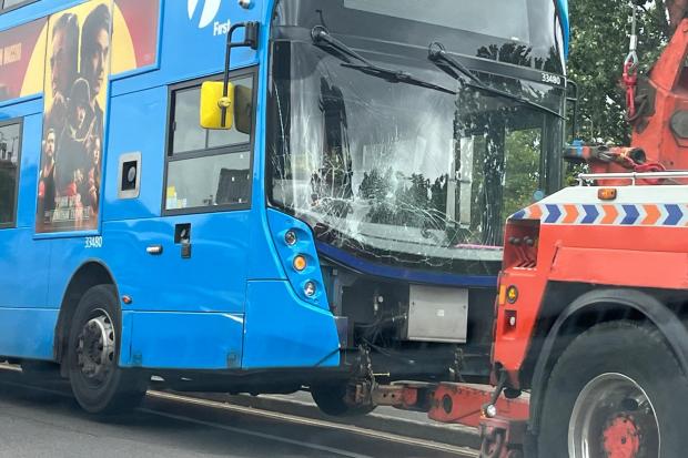First Bus with smashed windscreen towed in Taunton