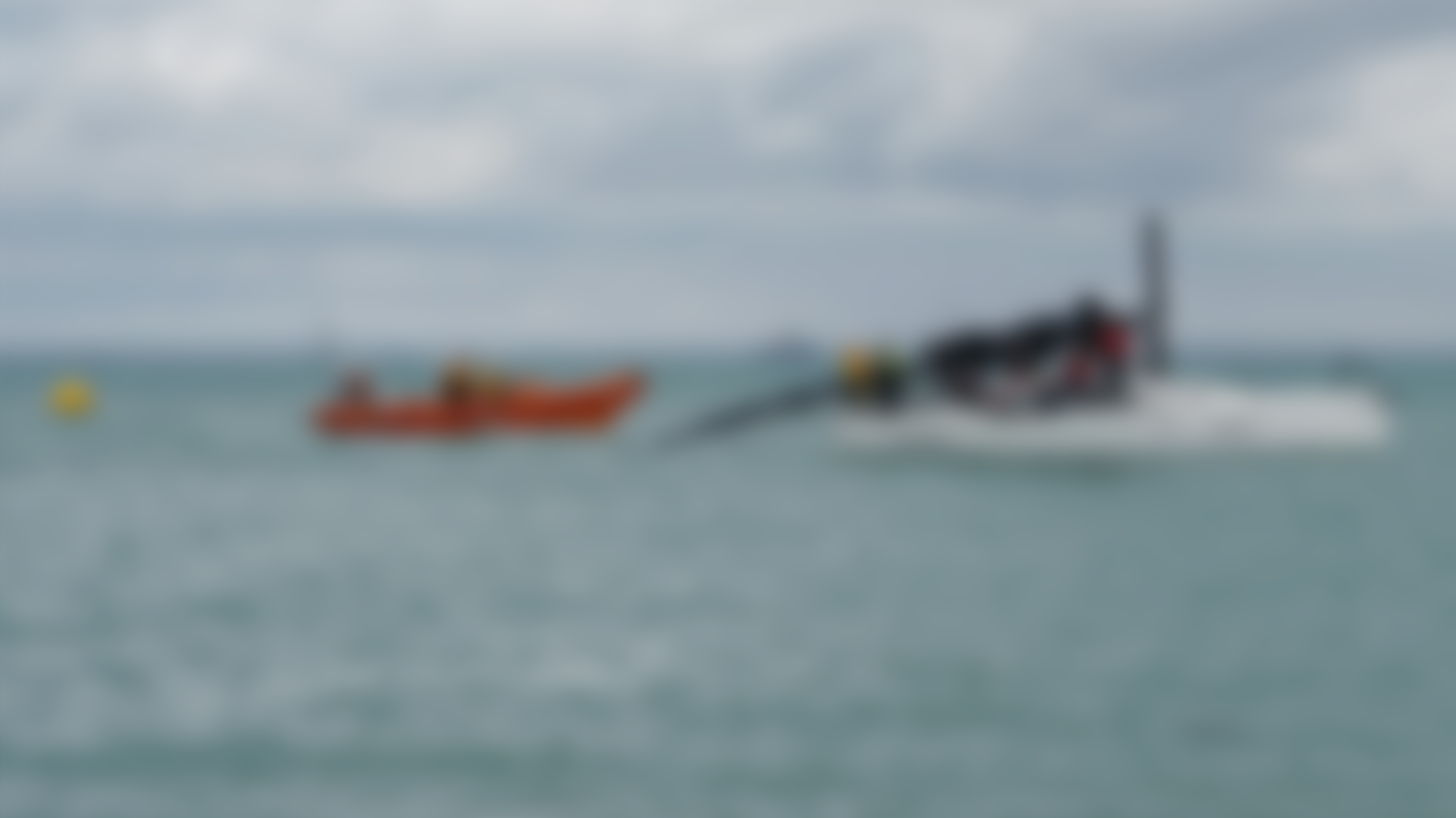 Stranded boaters rescued after clinging to overturned vessel overnight ...