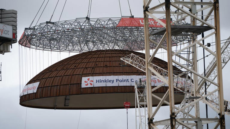World’s largest crane ‘Big Carl’ lifts reactor dome into place at Hinkley Point C