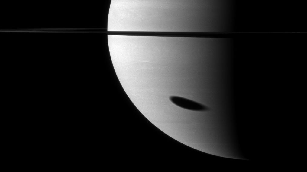A vast shadow will sweep over Saturn's cloud tops early on July 18 ...
