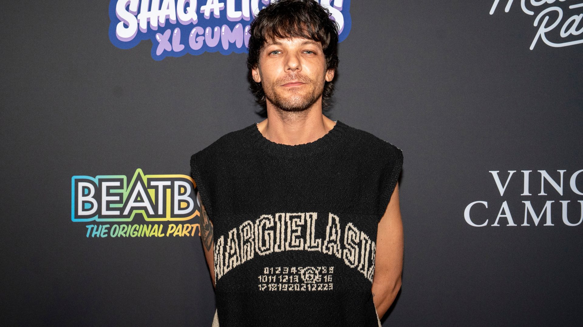 Louis Tomlinson calls out ‘conspiracy’ comments about his personal life