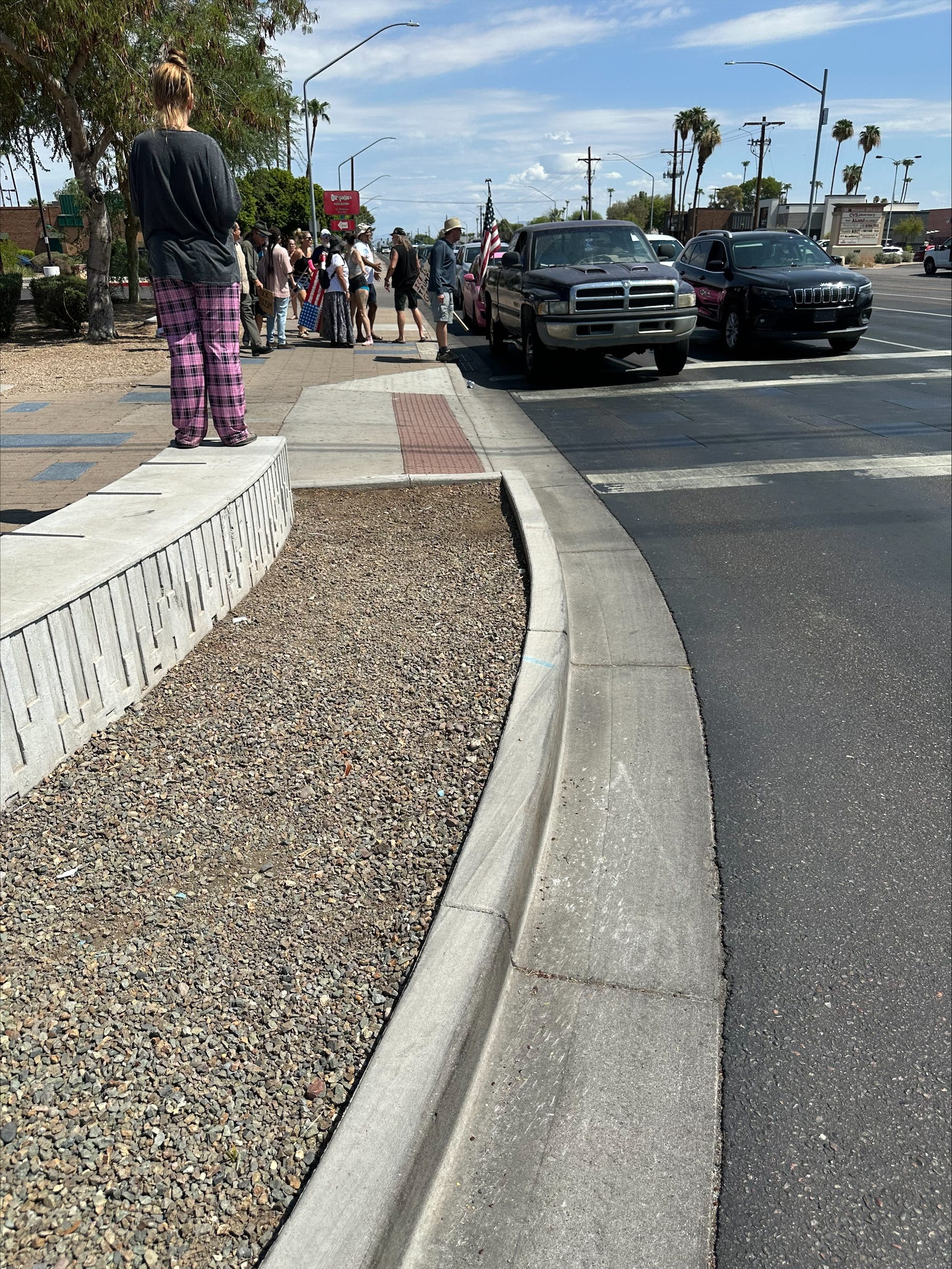 Man pulls out a gun at Mesa 'Good Trouble' protest: See photos