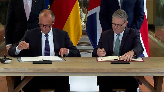 PM and German Chancellor sign first bilateral treaty since WWII