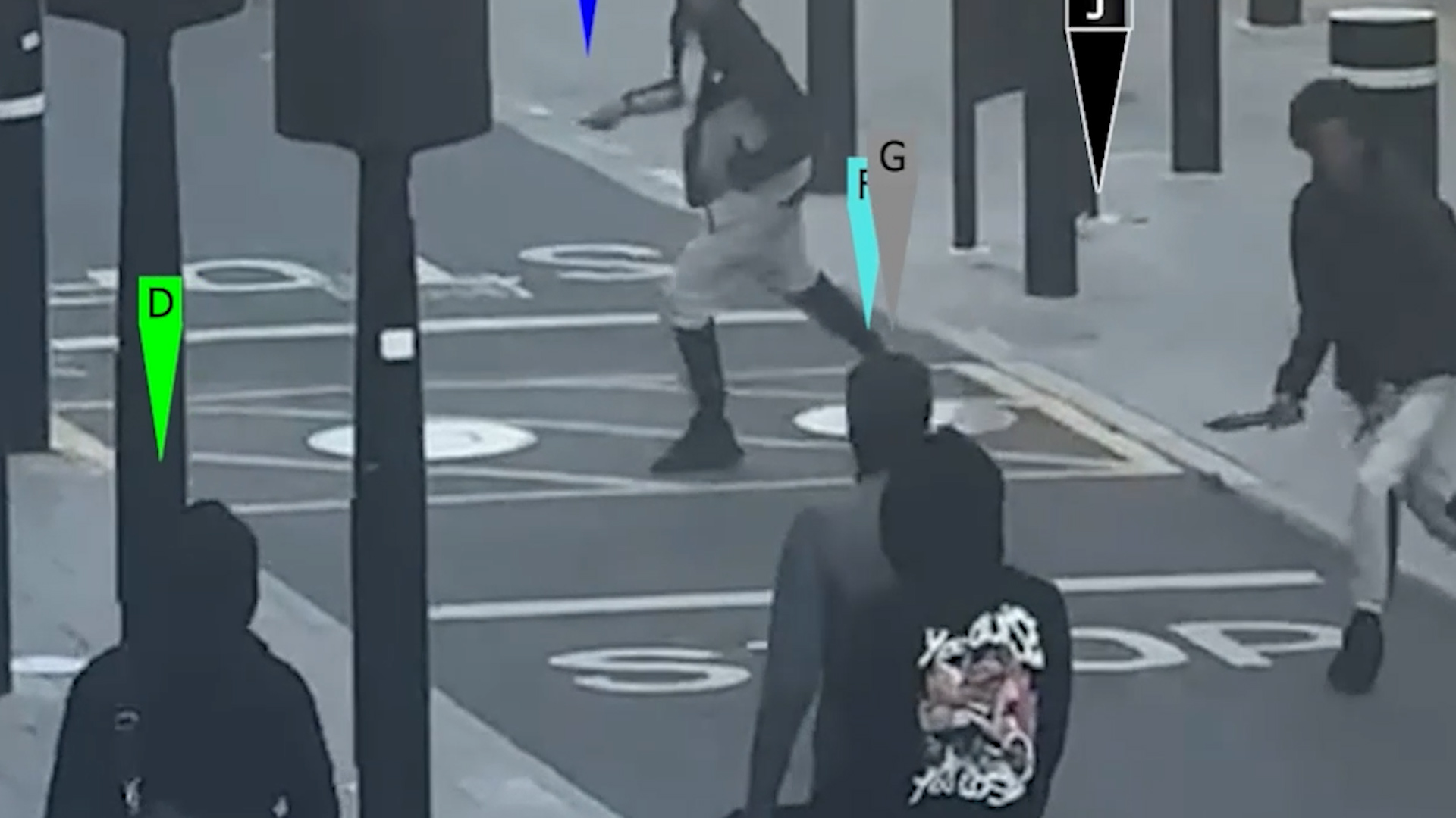 Moment ten teens march through seaside resort with machetes and firearm