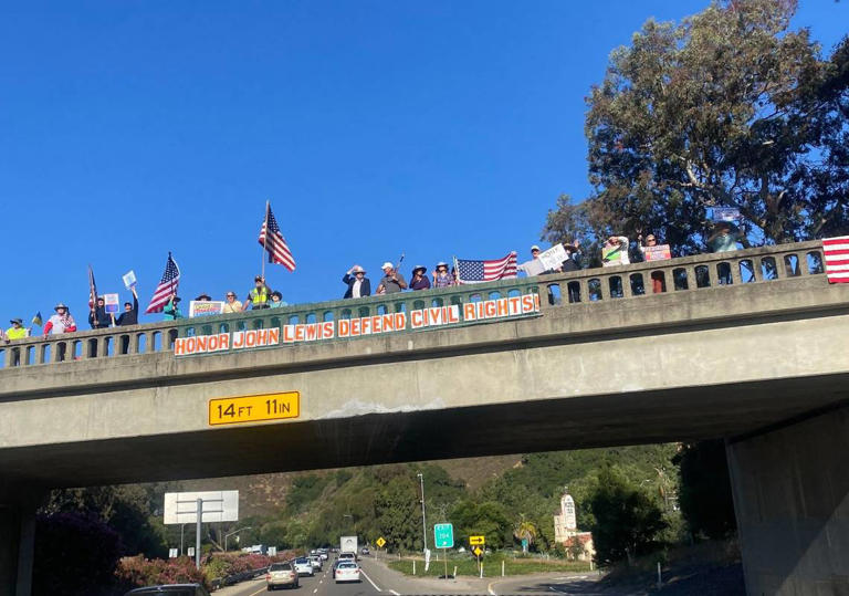 Hundreds gather to sing, protest during ‘Good Trouble' rallies in SLO ...