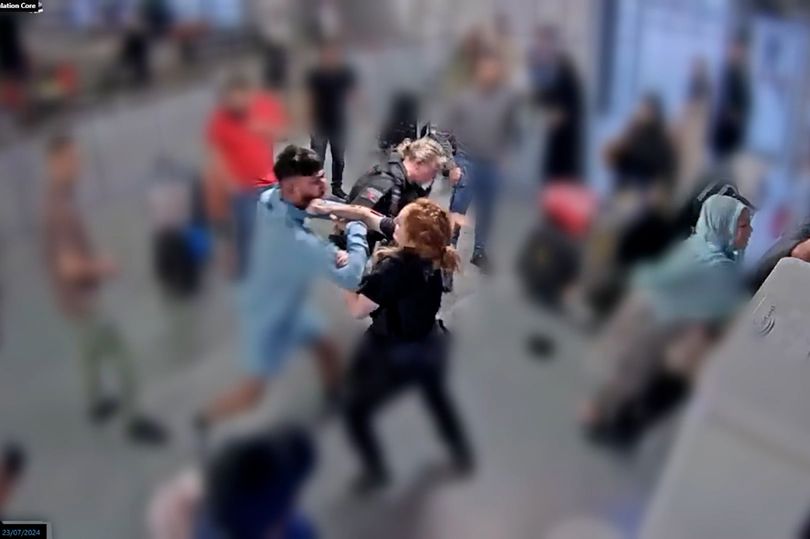 CCTV shows moment two men clash with police at Manchester Airport as ...